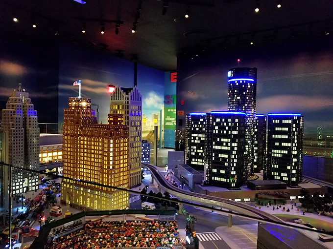 The Detroit skyline glows at "night" as the lighting system transforms MINILAND from day to evening, proving everything looks better with dramatic lighting.