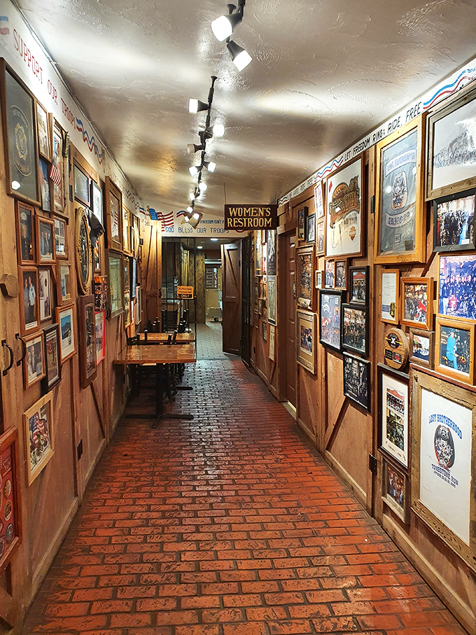 Even the hallways tell stories, brick floors and walls covered with framed pieces of history guide you through time.