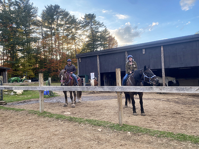 Sunset brings a special magic to evening rides, as riders pause to appreciate nature's daily masterpiece from the perfect vantage point.