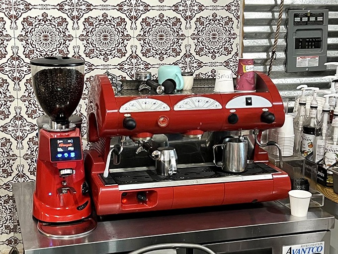 The bright red espresso machine isn't just eye candy; it's a hardworking beauty that produces coffee drinks worth writing home about.