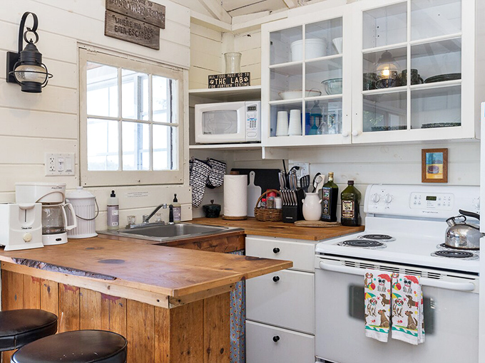 This humble cooking space proves you don't need granite countertops when you have windows framing million-dollar views.