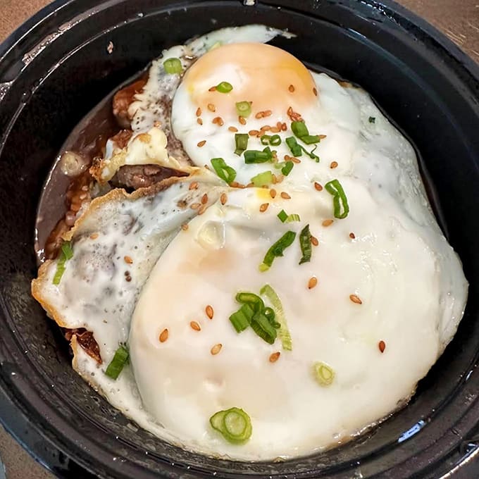 Loco Moco is Hawaiian comfort food royalty, that runny egg yolk mixing with gravy creates magic you'll want to bottle.
