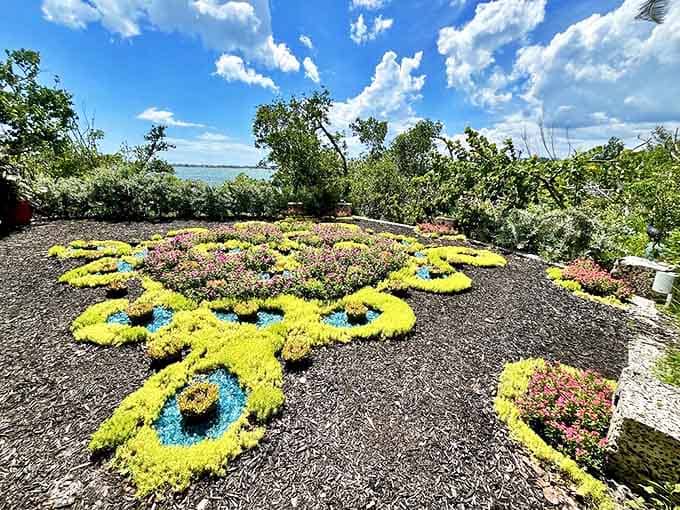 Living art blooms in this intricate ground mosaic, where carefully selected plants create patterns visible from above.