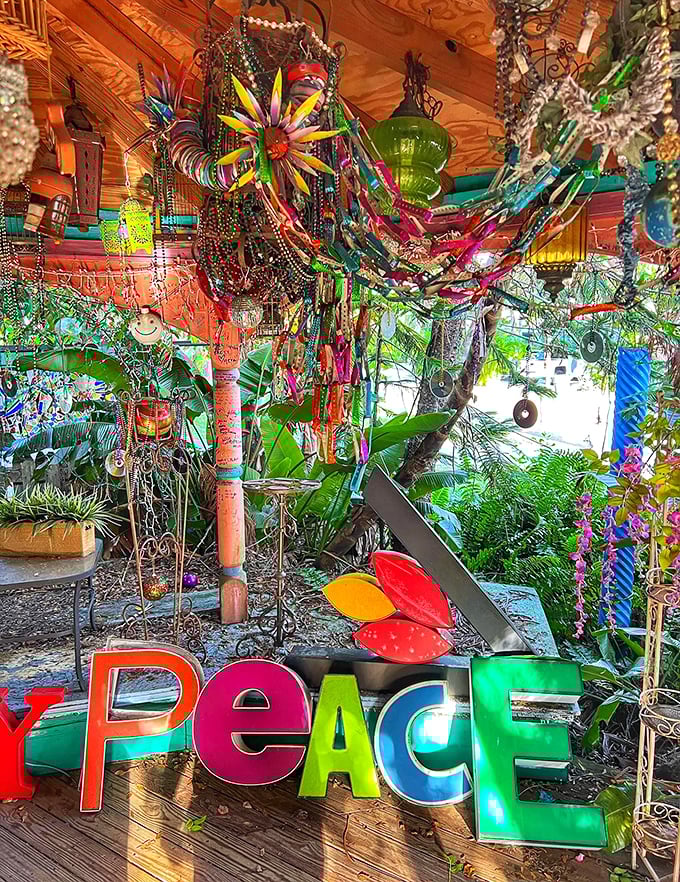 PEACE spelled in carnival letters captures the spirit of this artistic haven, where creative freedom trumps conventional design rules.