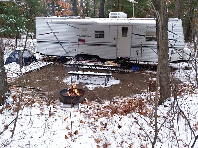 Winter transforms Sleeping Bear into a serene wonderland, where brave RV campers enjoy solitude and snow-draped forests all to themselves.