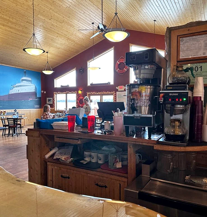 The service counter where coffee flows like conversation – fueling both bodies and the stories that make small towns so special.