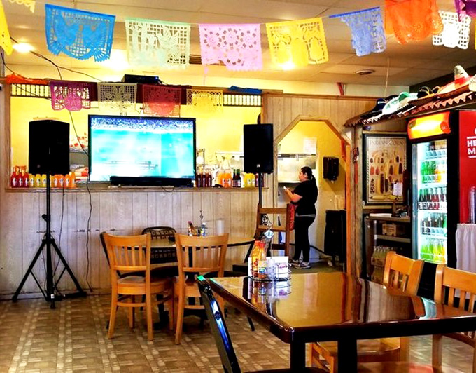 The service counter area shows the heart of the operation, where orders get placed and the magic starts happening behind those kitchen doors.