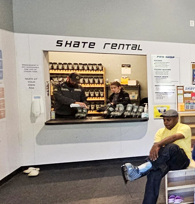 The skate rental window – where helpful staff match eager feet with the perfect pair of blades for gliding adventures.