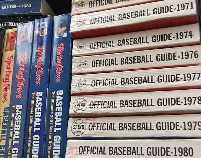 Baseball guides from decades past chronicle America's favorite pastime, each volume a time capsule of statistics, stories, and sporting legends.