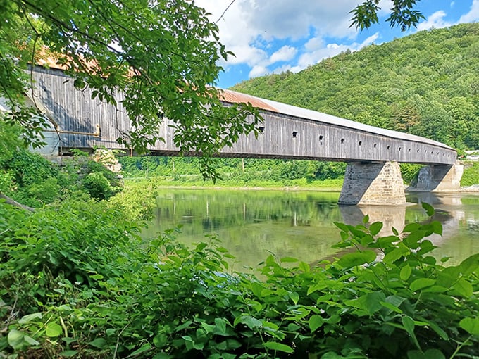 Modern vehicles now traverse where horse-drawn carriages once clip-clopped, though the 10-ton weight limit keeps the heaviest traffic away.