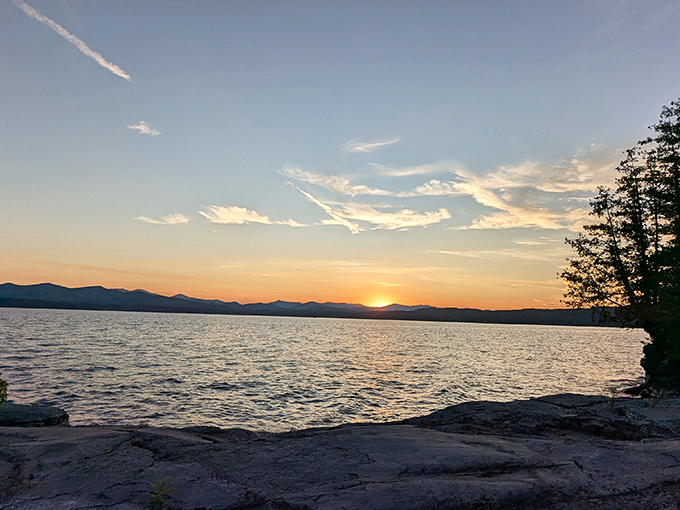 Button Bay State Park's sunset transforms Lake Champlain into liquid gold, silhouetting the Adirondacks in a daily spectacle worth waiting for.