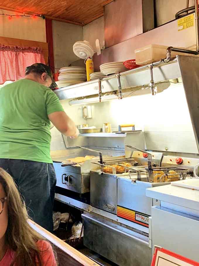 The kitchen where magic happens, one sizzling burger at a time, since the Roosevelt administration.