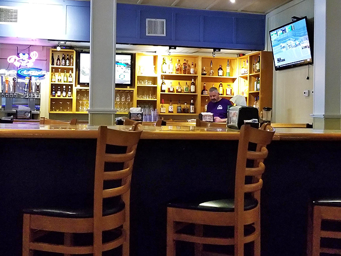 Where cocktails with umbrellas meet seafood cravings &ndash; a well-stocked oasis for those waiting for tables or simply enjoying happy hour treasures.