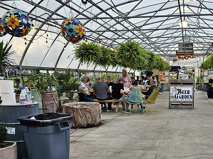 The greenhouse beer garden offers weary shoppers a civilized pit stop&mdash;because grocery decisions require proper hydration.