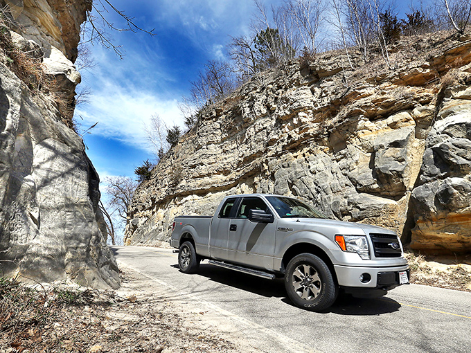This modern vehicle passes effortlessly through a passage that once required over a year of backbreaking labor to create.