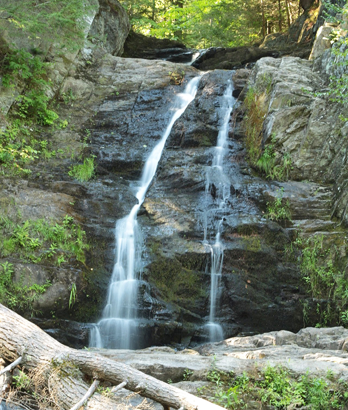 The main attraction reveals itself &ndash; Cascade Falls puts on a hypnotic show as water tumbles over ancient Maine bedrock.