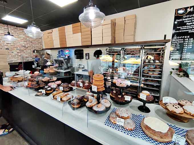 Behind that bright counter, magic happens daily as flour and sugar transform into edible joy.