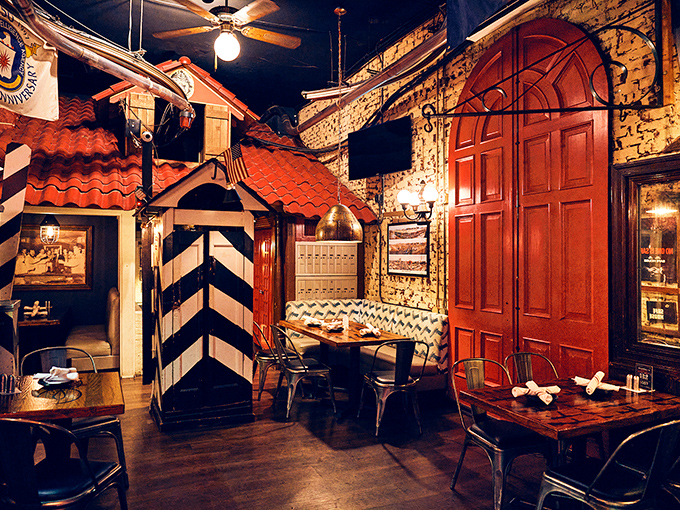 The SafeHouse's immersive decor includes guard towers, striped barriers, and enough spy memorabilia to stock a small intelligence museum.