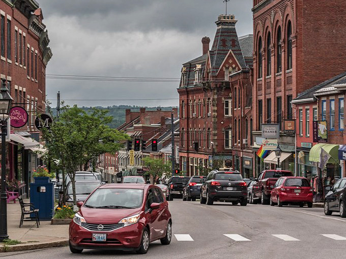 Colorful historic buildings line the streets, housing everything from art galleries to the famous Colonial Theatre.
