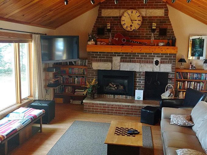Books, board games, and a brick fireplace &ndash; this cottage living room is the antidote to doom-scrolling and notification anxiety.