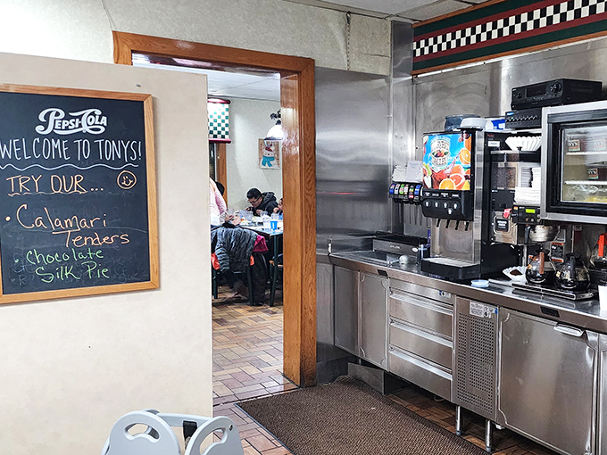 Behind the scenes magic: Tony's kitchen, where bacon sizzles by the truckload and pancakes are flipped with the precision of Olympic athletes.