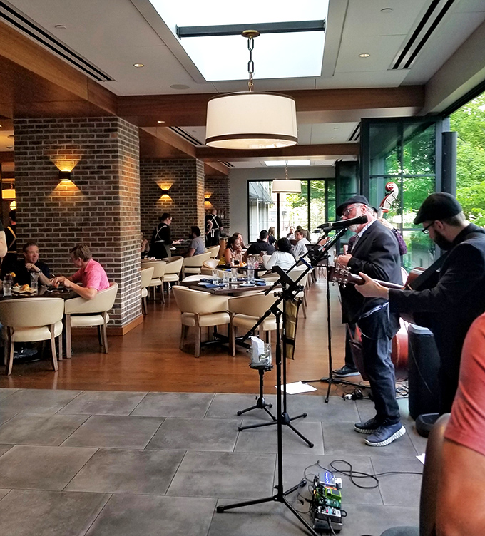 Jazz notes float through the air as diners savor their meals, adding another sensory dimension to an already rich experience.