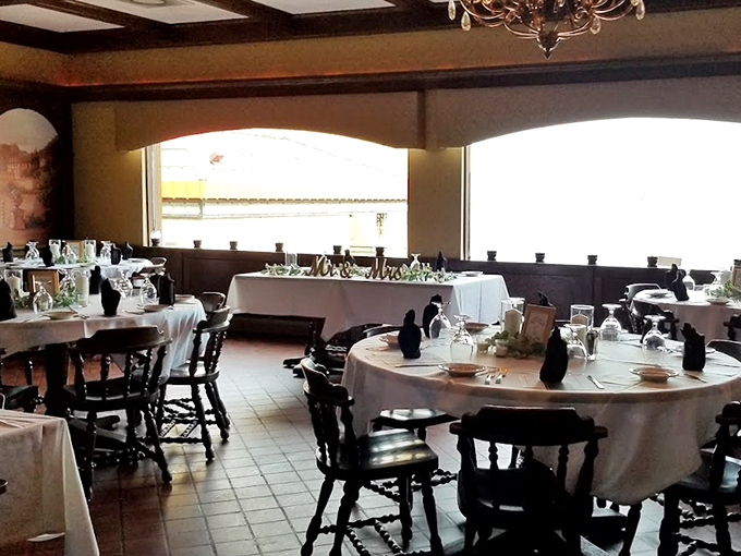 White tablecloths and wooden chairs create an atmosphere of unpretentious elegance where memories have been made for generations.