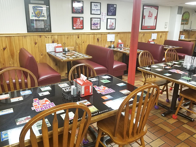 Red chairs pop against wooden paneling, creating that classic Maine eatery vibe. Simplicity with purpose&mdash;just like the food it serves.