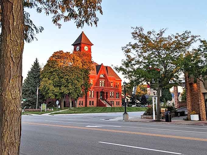 Ludington's waterfront park offers peaceful pond views and walking paths surrounded by trees showing off Michigan's beautiful fall colors.