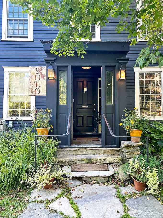 This charming farmhouse exterior promises the kind of home-cooked comfort food that makes Vermont dining so special and memorable.