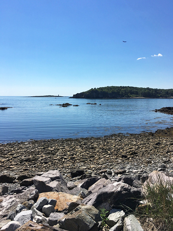 Calm waters and distant islands create a postcard-perfect view of Casco Bay, where Portland's maritime heritage continues to thrive.