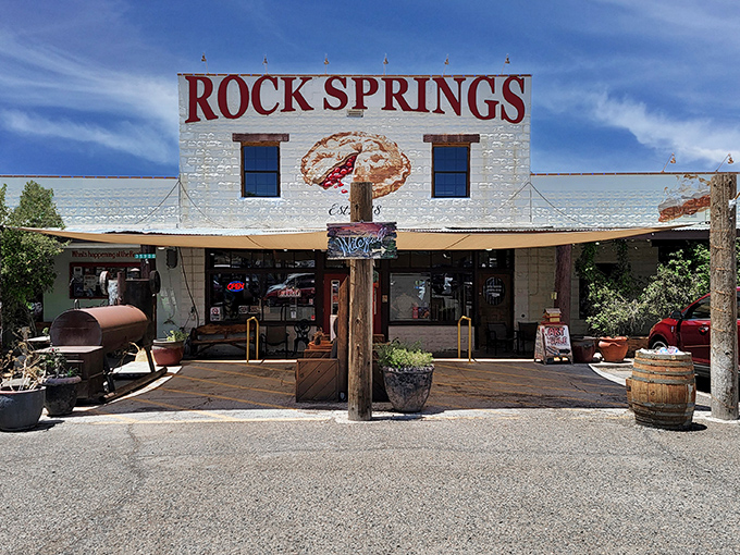 The rustic exterior of Rock Springs Cafe has been welcoming hungry travelers since 1918 with its old-west charm.