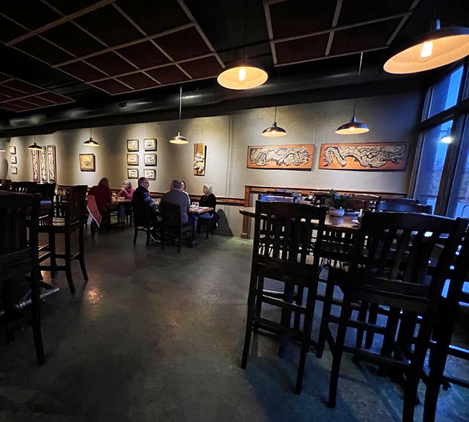 High ceilings and thoughtful lighting create an atmosphere that's simultaneously spacious and intimate &ndash; the hallmark of great restaurant design.