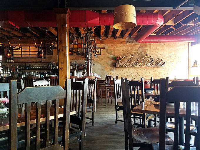 Wooden beams frame a dining room where memories are made&mdash;casual comfort in every corner.