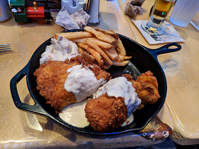 The "Tar Pit Fried Chicken" delivers crispy, juicy comfort food that might have you wondering if dinosaurs really did taste like chicken after all.