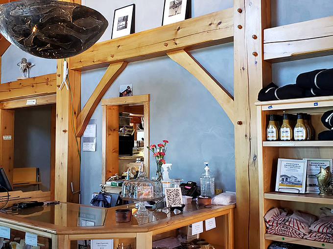 The heart of hospitality &ndash; warm wood tones and blue walls create a welcoming space where local treasures and handcrafted goods await discovery.