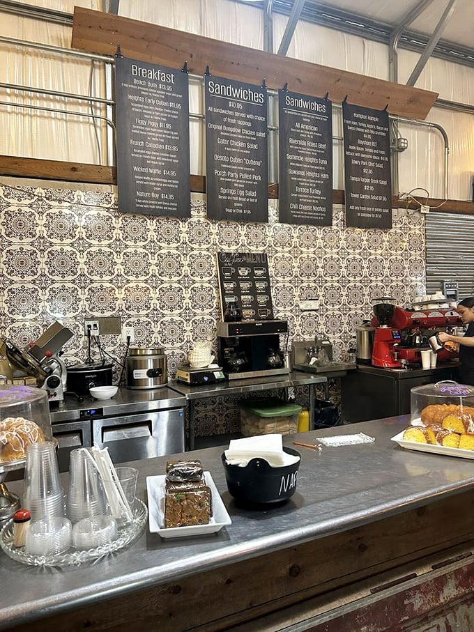 Behind that patterned tile backsplash, sandwich magic happens while you browse local goods and contemplate your delicious options.