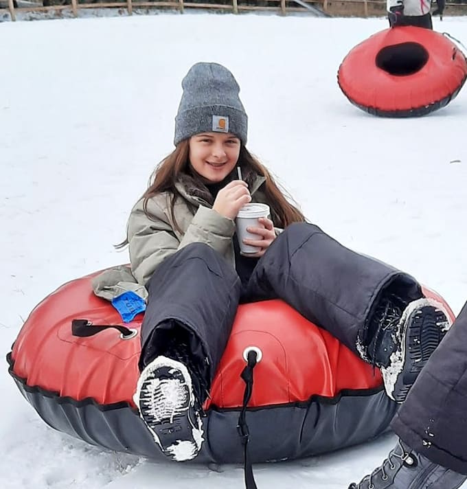 Nothing beats the pure joy of snow tubing with a hot drink in hand, combining two of winter's greatest pleasures into one perfect moment.