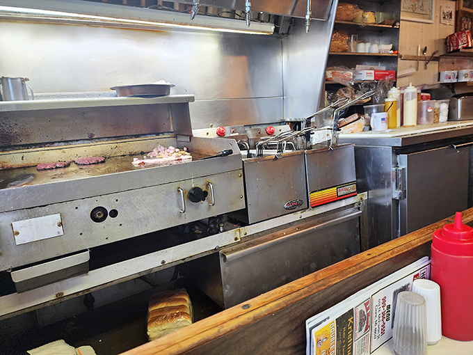 Behind the scenes magic: where decades-old equipment and well-seasoned grills impart flavors no shiny new kitchen could ever hope to achieve.