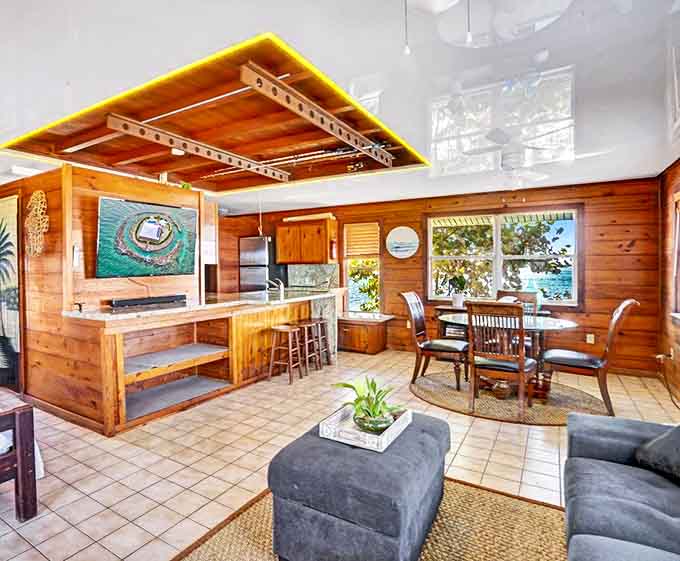 Warm wood tones and nautical touches create the perfect balance between rustic charm and modern comfort in this floating paradise.