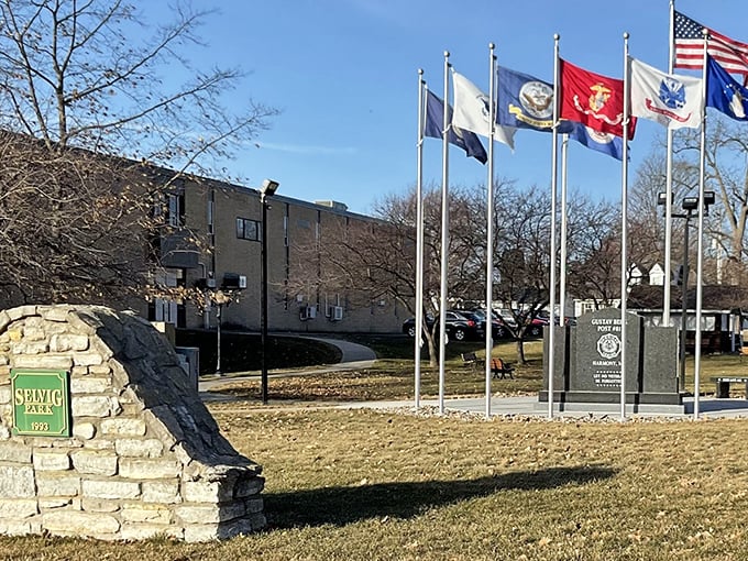 Selvig Park's military memorial creates a place for reflection, where flags honor service members and the community's patriotic spirit stands tall against Minnesota skies.