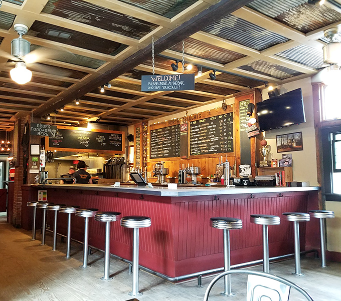 The heart of the operation &ndash; where burger magic happens amid the controlled chaos of a busy kitchen serving up consistent excellence.