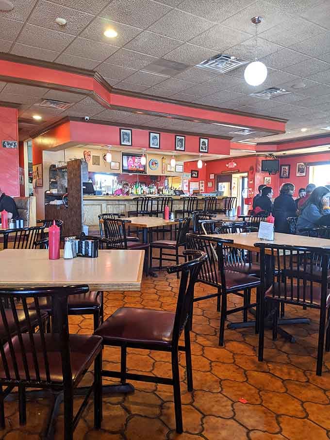 The dining room balances Beatles memorabilia with comfortable seating, creating an atmosphere that's both nostalgic and welcoming for modern families.