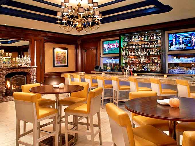 TRIA's bar invites lingering conversations &ndash; where craft cocktails and comfortable seating turn strangers into friends by evening's end.