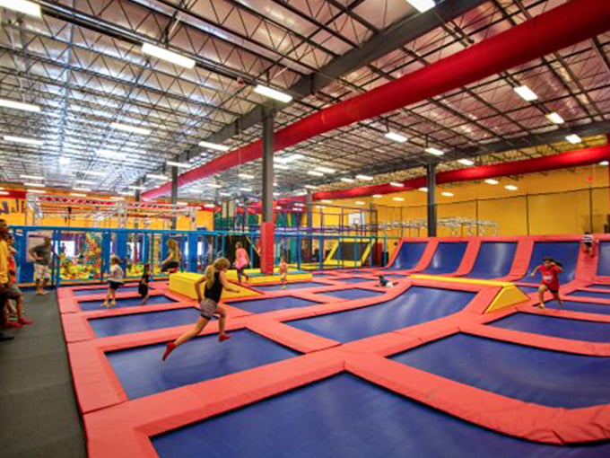 Trampoline Jumping Area: The ultimate playground for defying gravity, where air time equals joy time in this bouncy paradise.