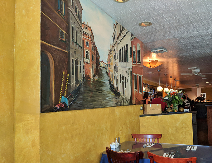 A mural transporting diners straight to Venice &ndash; no passport required, just an appetite for adventure and good pasta.