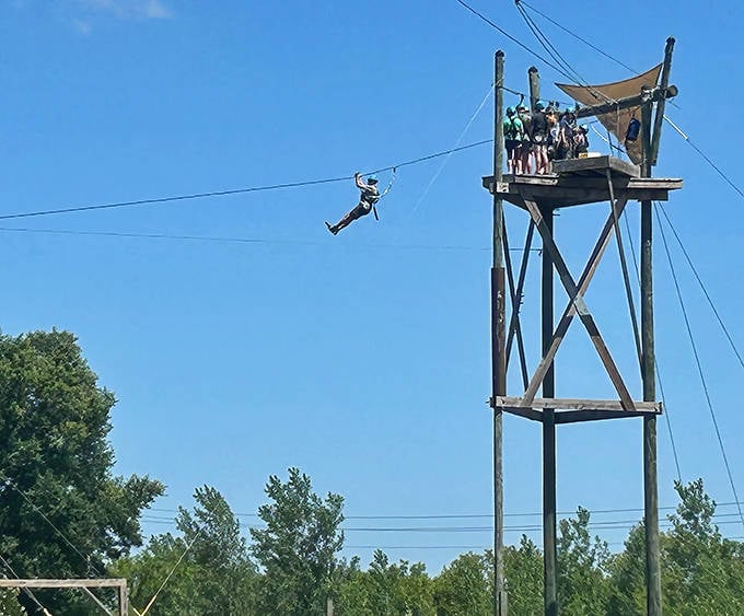 The moment of truth atop Kerfoot's impressive launch tower, where visitors prepare for an unforgettable flight across the valley.