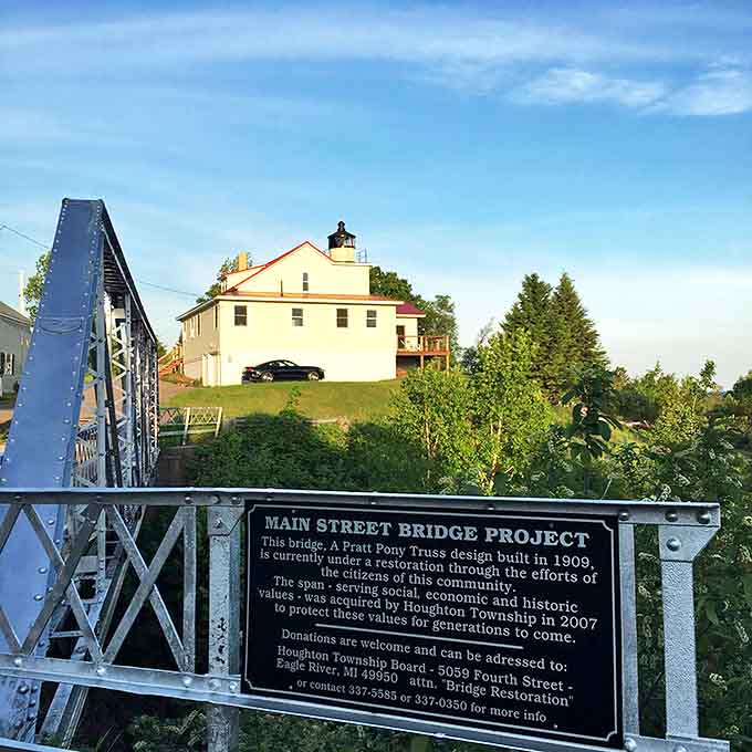 The historic Main Street Bridge connects past and present in Eagle River, a community treasure being lovingly restored just like the nearby lighthouse.