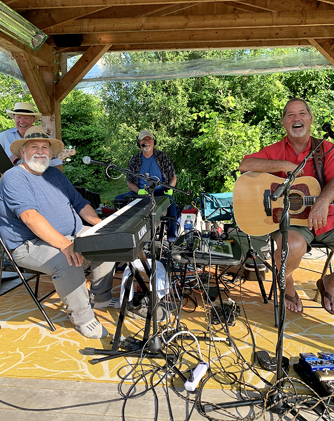 Weekend soundtrack providers: Local musicians bring the vineyard to life with melodies that drift across the water, enhancing every sip.