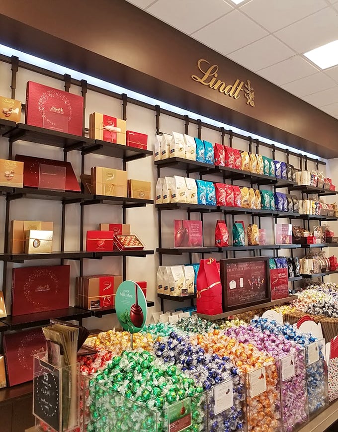 Lindt's chocolate paradise – where willpower goes to die and happiness comes individually wrapped. Diet resolutions have no power in this realm.